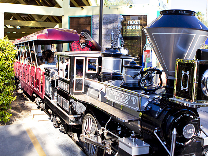 All aboard the Enchanted Express! This miniature locomotive proves that sometimes the best journeys are the ones that bring you right back where you started.