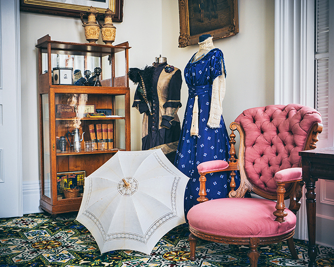 Victorian fashion: when "breathtaking" was literal. That blue dress could hide a small village, and the parasol's perfect for impromptu fencing.