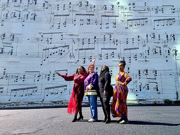 Striking a pose in front of nature's jukebox. These visitors are clearly in tune with the city's coolest attraction.