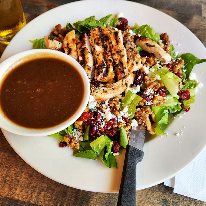 A salad that's more exciting than most people's vacations. Cranberries and greens mingle like they're at the world's tastiest party.