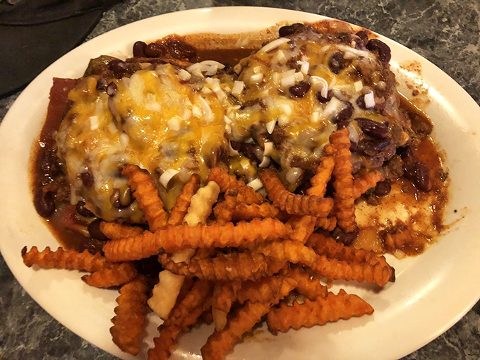 Double the patty, double the fun! This burger stack is taller than some Nevada mountain ranges and twice as satisfying.