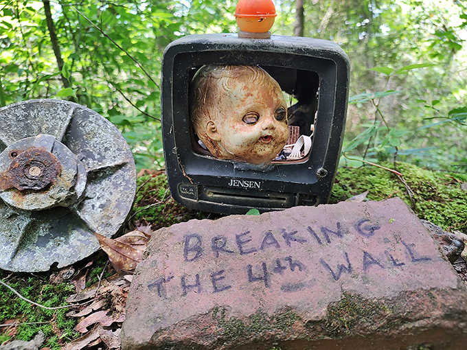 Breaking news: This trail breaks the fourth wall! A cheeky art installation that proves even dolls can't resist the allure of reality TV.