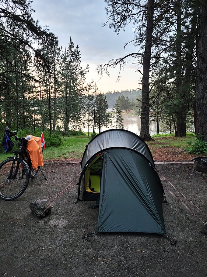 Tent sweet tent! This lakeside campsite is proof that sometimes the best room service comes with a side of pine needles.