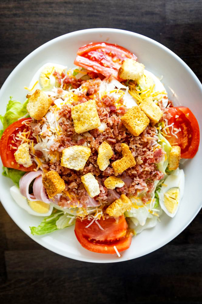 This chef's salad is like a garden party where all the cool veggies got invited. Croutons are the life of the party!