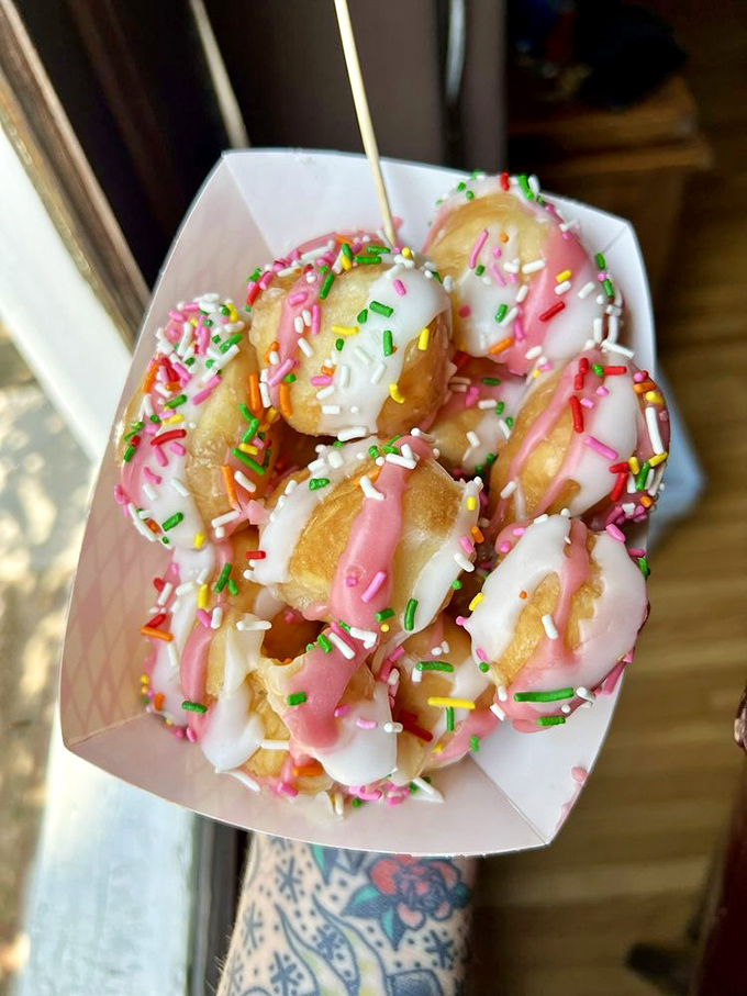 Bite-sized bliss! These colorful donut holes are like edible confetti, perfect for celebrating... well, anything!