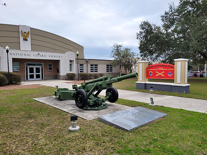 Patriotism meets small-town pride: The National Guard Armory stands ready, complete with a cannon that's seen more pigeons than action.