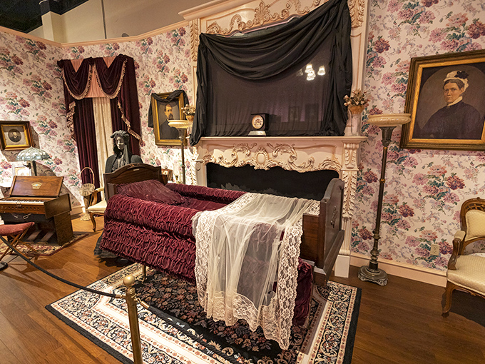 Victorian mourning chic at its finest. This bedroom setup is giving serious 'Downton Abbey meets Adams Family' vibes.