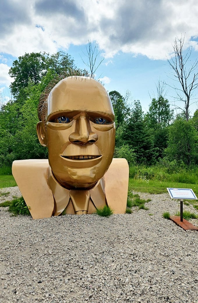 Is it just me, or does this golden giant look like he's about to ask, "Why so serious?" Awakon Park's sculptures have personality plus!
