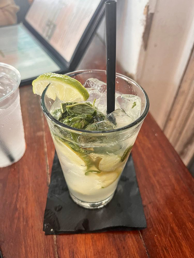 Key lime mojito: Where cocktail hour meets Florida's favorite citrus. It's like a vacation in a glass, minus the sunburn and sand in your shoes.