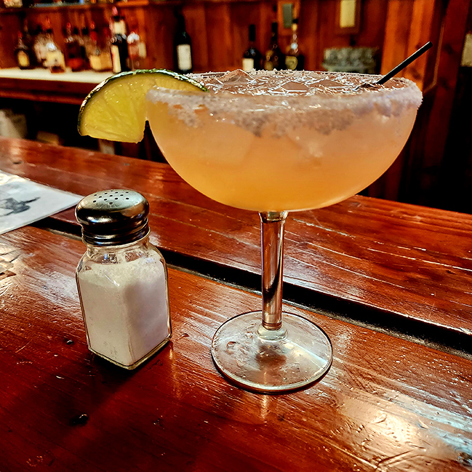 Liquid sunshine in a glass! This margarita's got more kick than a rodeo bull. Careful, cowpokes – it goes down easier than you'd think.