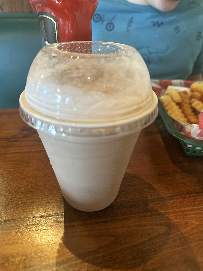 Is it a milkshake or liquid happiness? Either way, it's the perfect partner for your burger adventure. Resistance is futile!