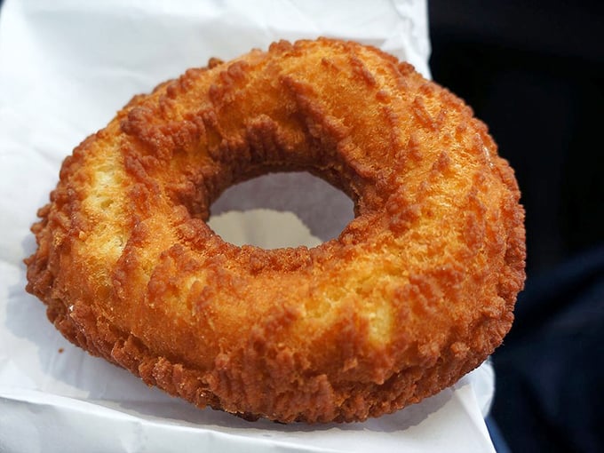 Simplicity at its finest. This plain donut is the little black dress of the pastry world &ndash; classic, elegant, and always in style.