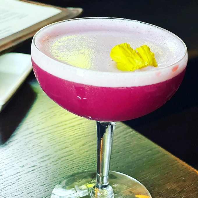 Purple Rain in a glass? Prince would approve. This cocktail is so pretty, you almost don't want to drink it. Almost. 