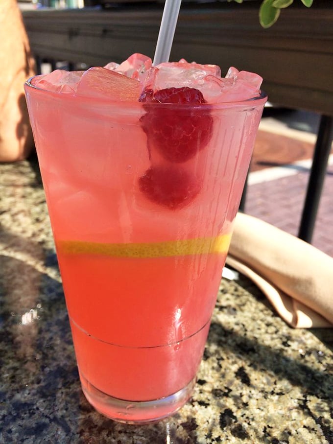 Pink drink perfection! This raspberry lemonade looks like it could cure your thirst and your bad mood in one sip.