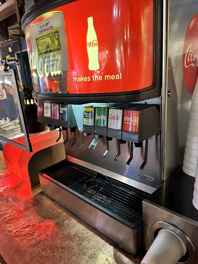 Quench your thirst in style! This retro soda machine is serving up nostalgia with a side of fizz. Coca-Cola still "makes the meal"!
