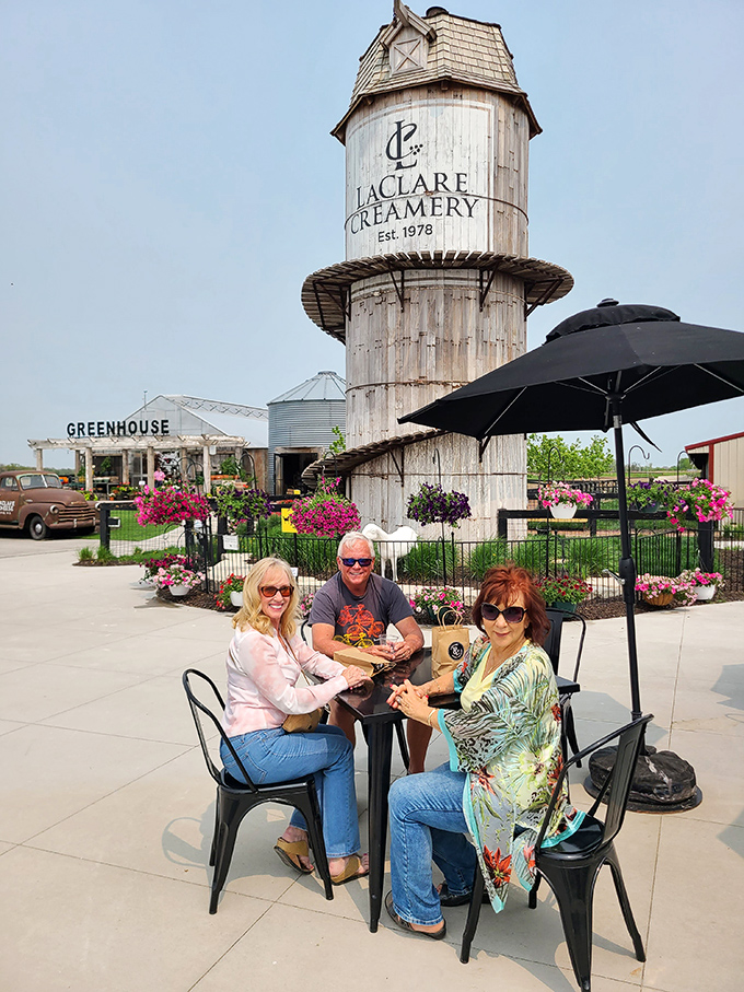 Happy campers at the creamery! These folks have found their cheese nirvana, and their smiles are more infectious than a cat video.
