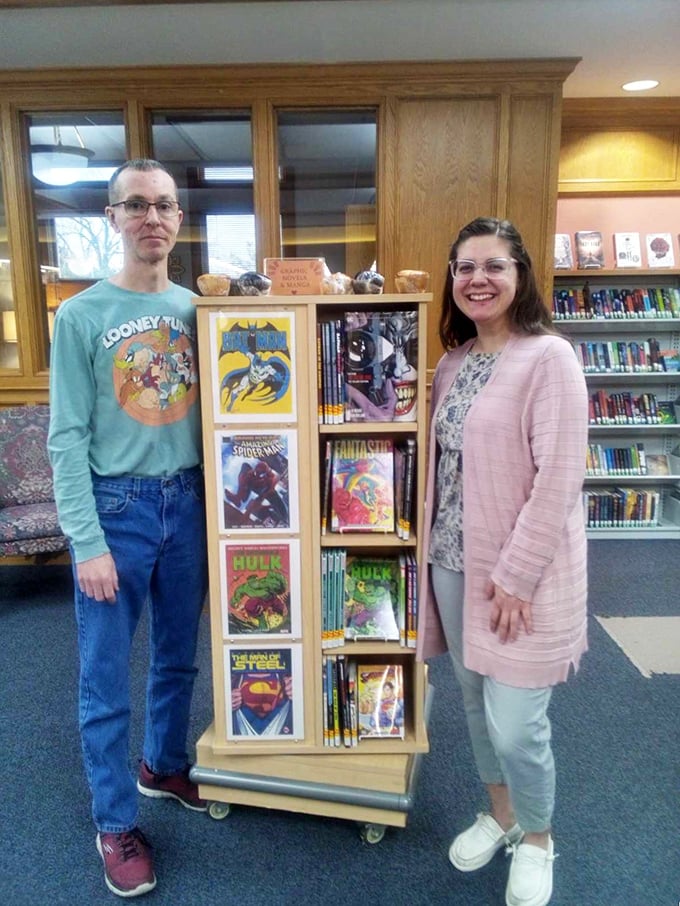 Comic book heaven! These two look like they've stumbled upon the Holy Grail of graphic novels. Excelsior, indeed!