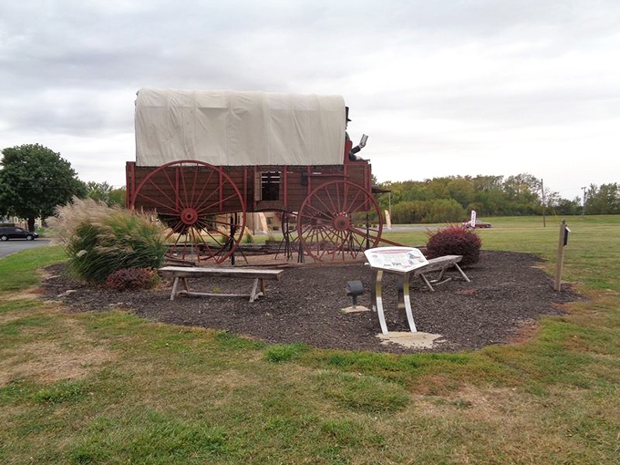 Route 66 meets the Oregon Trail in this surreal roadside scene. It's like "Little House on the Prairie" got a Hollywood makeover!