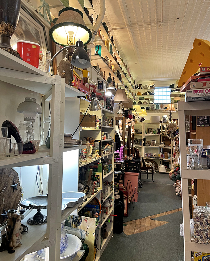 Navigate this narrow passage with care! It's like Indiana Jones exploring the Cave of Wonders, but with more lamps and less booby traps.