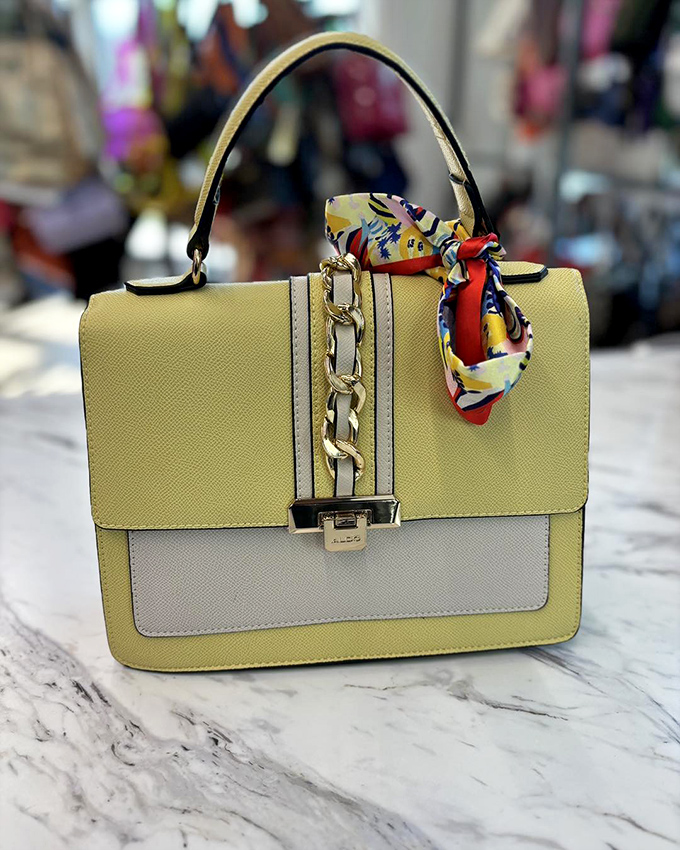Hello, gorgeous! This sunny yellow handbag is brighter than my mood after finding a parking spot at the mall.