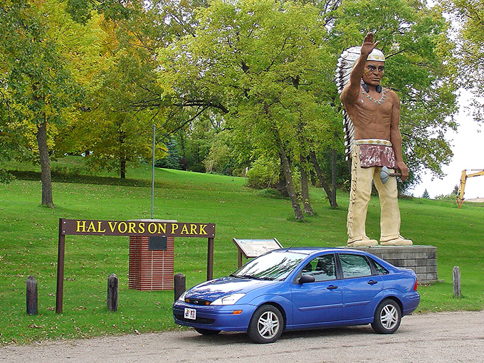 Even cars look tiny next to this towering tribute. It's like a real-life game of 'Guess Who?' &ndash; Minnesota style!