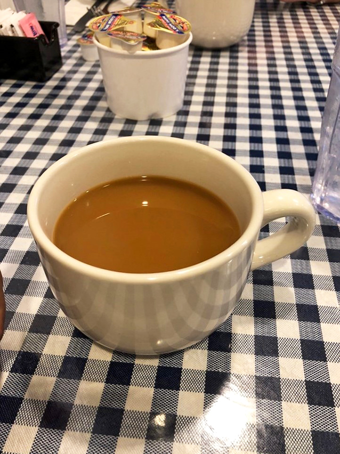 Coffee so inviting, it practically whispers "Good morning!" This steaming cup of joe is the liquid motivation you need to face the day.