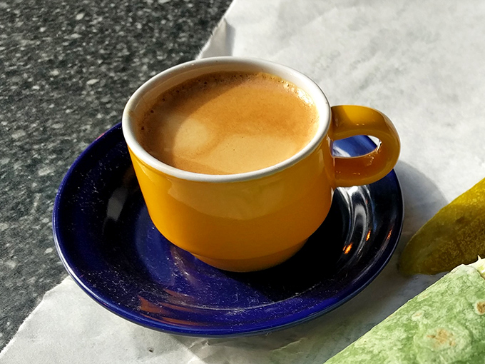 Coffee and a pickle? It's not mad science, it's deli magic! This unlikely duo is the Batman and Robin of lunch breaks.