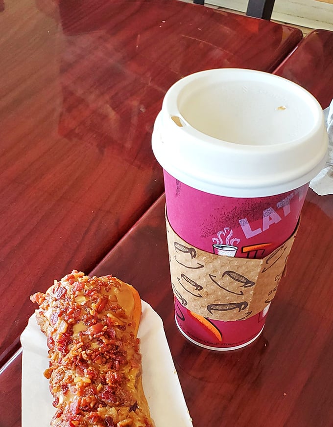 The dynamic duo! This maple bacon long john and steaming coffee are the Batman and Robin of breakfast indulgence.