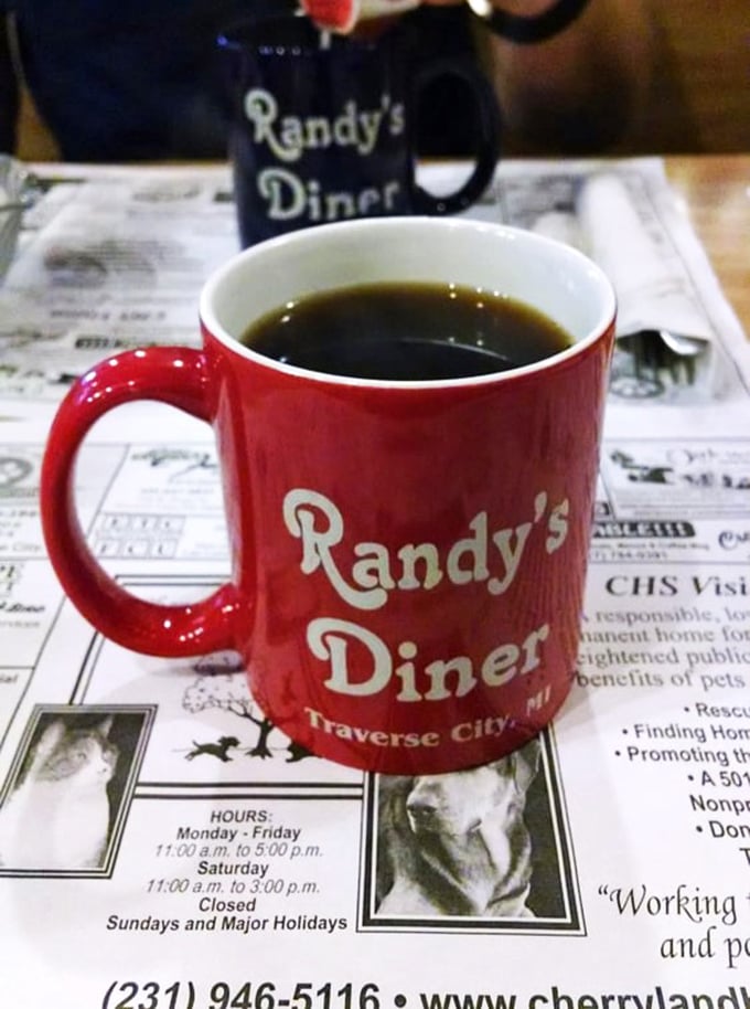 Coffee: the elixir of life! Randy's signature mug promises a brew so good, it might just replace your morning crossword as the best way to kickstart your brain.