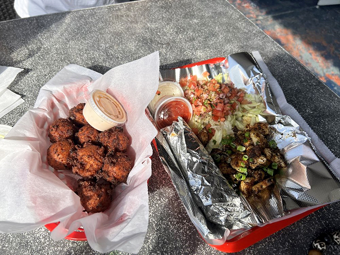 Dynamic duo alert! Conch fritters and fish tacos join forces to create a flavor superhero team on your plate.