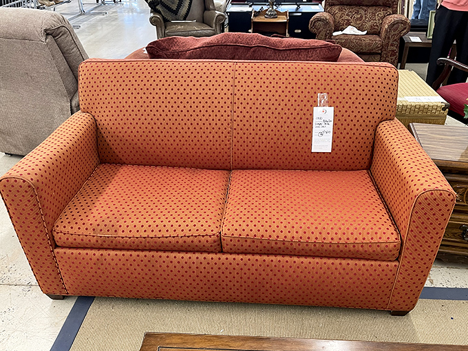 This couch has seen some stories, and now it's ready to be part of yours. Orange you glad secondhand furniture can be so charming?