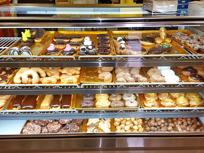 Behold, the wall of temptation! This display case is like a museum of edible art. Michelangelo would be proud (and probably hungry).