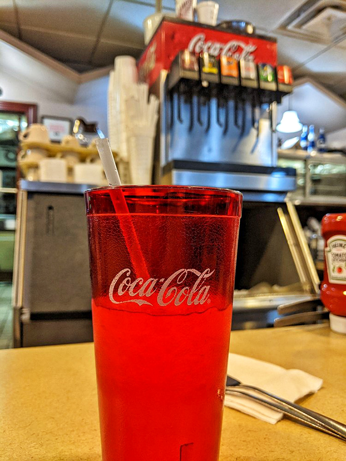 Pause for refreshment! Nothing washes down a hearty meal quite like an ice-cold Coca-Cola from a classic fountain.