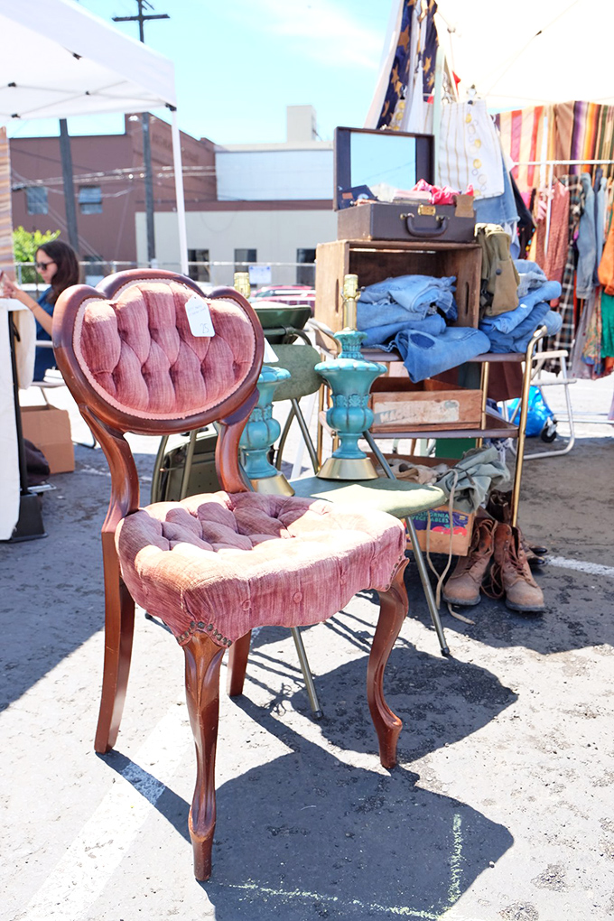 Mid-century magic meets shabby chic charm! This pink velvet chair is the throne every vintage queen deserves. Can you resist its royal allure?