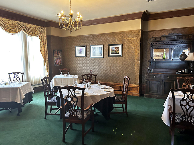 Green with envy? You will be after seeing this emerald-hued dining room, where every meal feels like a special occasion.