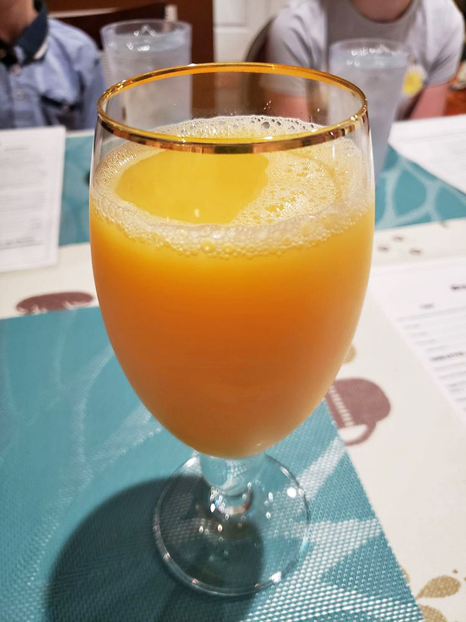Sunshine in a glass! This vibrant orange juice is so fresh, you'll swear you can hear citrus groves whispering their approval.