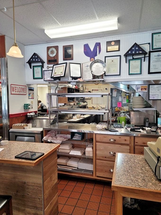 Where the magic happens! Rolly's kitchen is like Santa's workshop, but instead of toys, they're crafting edible joy. No elves spotted, but the cooks seem just as merry!