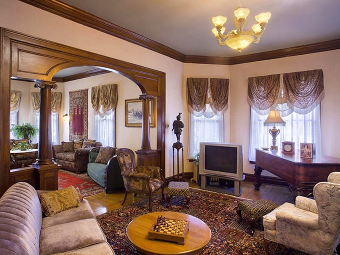 Comfort meets class in this living room. It's the perfect spot for sipping tea, playing chess, or plotting your next great American novel.