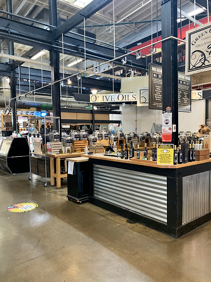 Olive you need is love... and maybe some gourmet oil! This display is liquid gold for any home chef's culinary adventures.