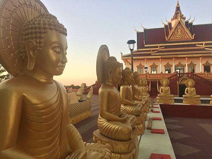 Sunset at the temple: where Minnesota meets Cambodia in a breathtaking cultural fusion.