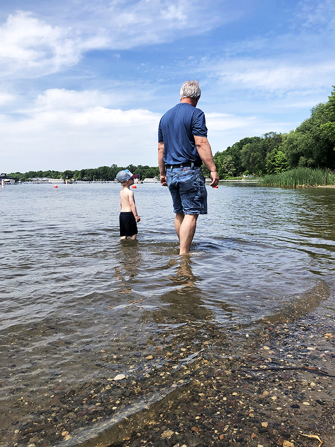 Generations bonding over ripples and rocks: A timeless scene that's sweeter than your grandma's hotdish.