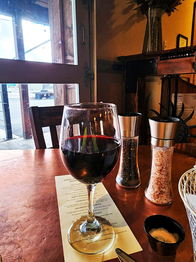 Raise a glass to good taste! This wine setup is like a still life painting you can drink, with salt and pepper standing guard.