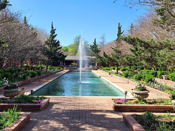Take a stroll along this grand, serene waterway, where the fountain&rsquo;s gentle mist and vibrant flowers invite you to pause and breathe deep. It&rsquo;s like stepping into a lush garden oasis right in the heart of Texas.