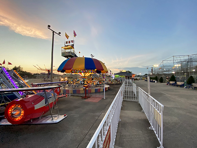"Fore the love of fun! Grady's whimsical windmill stands guard over a mini-golf course that's more colorful than a bag of Skittles."