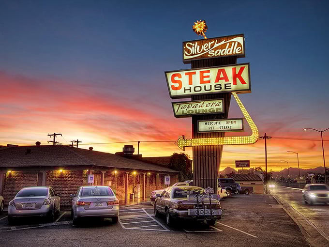 The Silver Saddle: Where neon lights guide you to beefy delights. It's like Vegas and a ranch had a delicious love child.