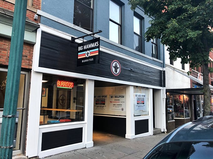 Sleek black and white storefront &ndash; it's like BBQ got a makeover from Queer Eye, but kept its saucy personality.