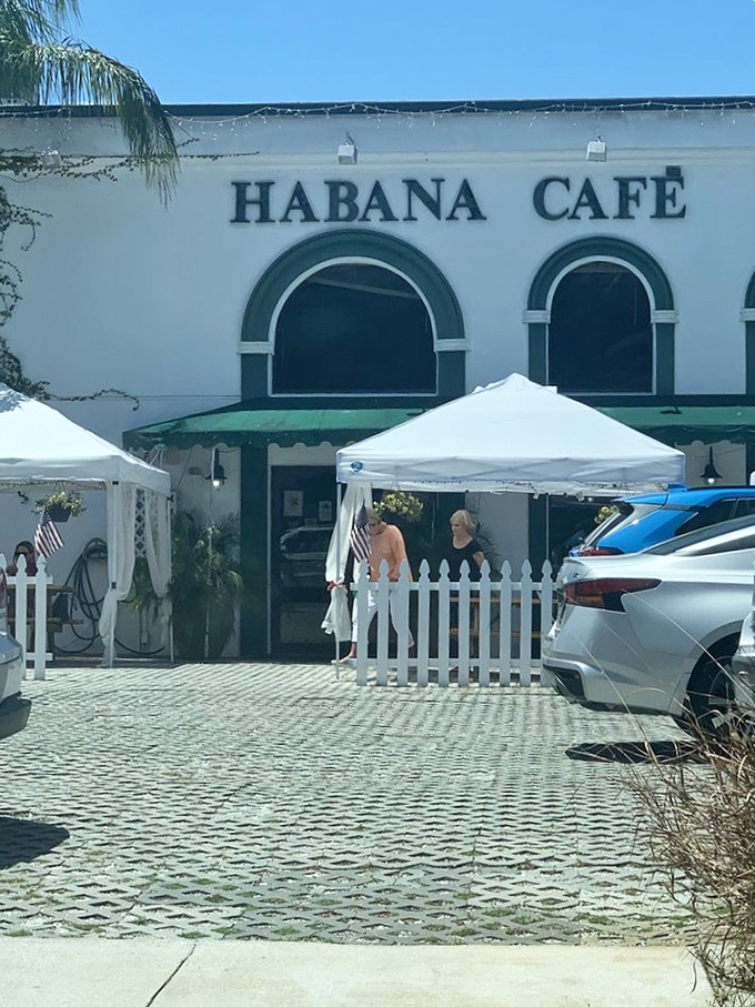 White building, green awnings, red-hot flavors. Habana Cafe is a postcard from Cuba, delivered right to your plate.
