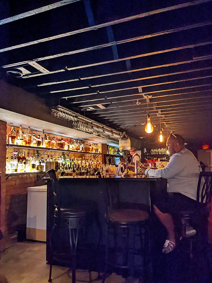 Shaken, stirred, and maybe shampooed? Johnny's bar brings new meaning to "getting a little off the top." Cheers to multitasking!