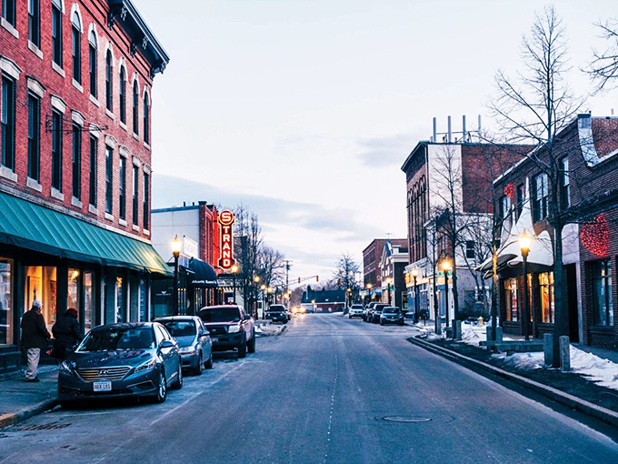 Take a stroll down Main Street and soak in the historic charm of the brick buildings and the iconic Strand Theatre sign.