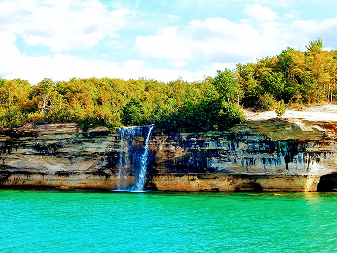 Spray Falls from the lake: Proof that some views are worth rocking the boat for. It's IMAX, nature-style!